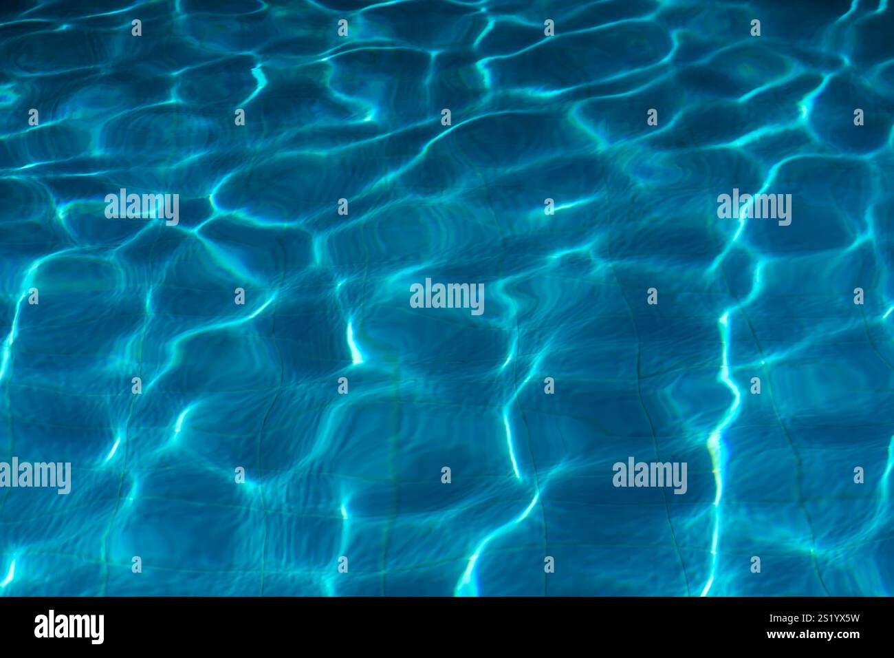 Blue swimming pool water surface and ripple wave background. Summer ...