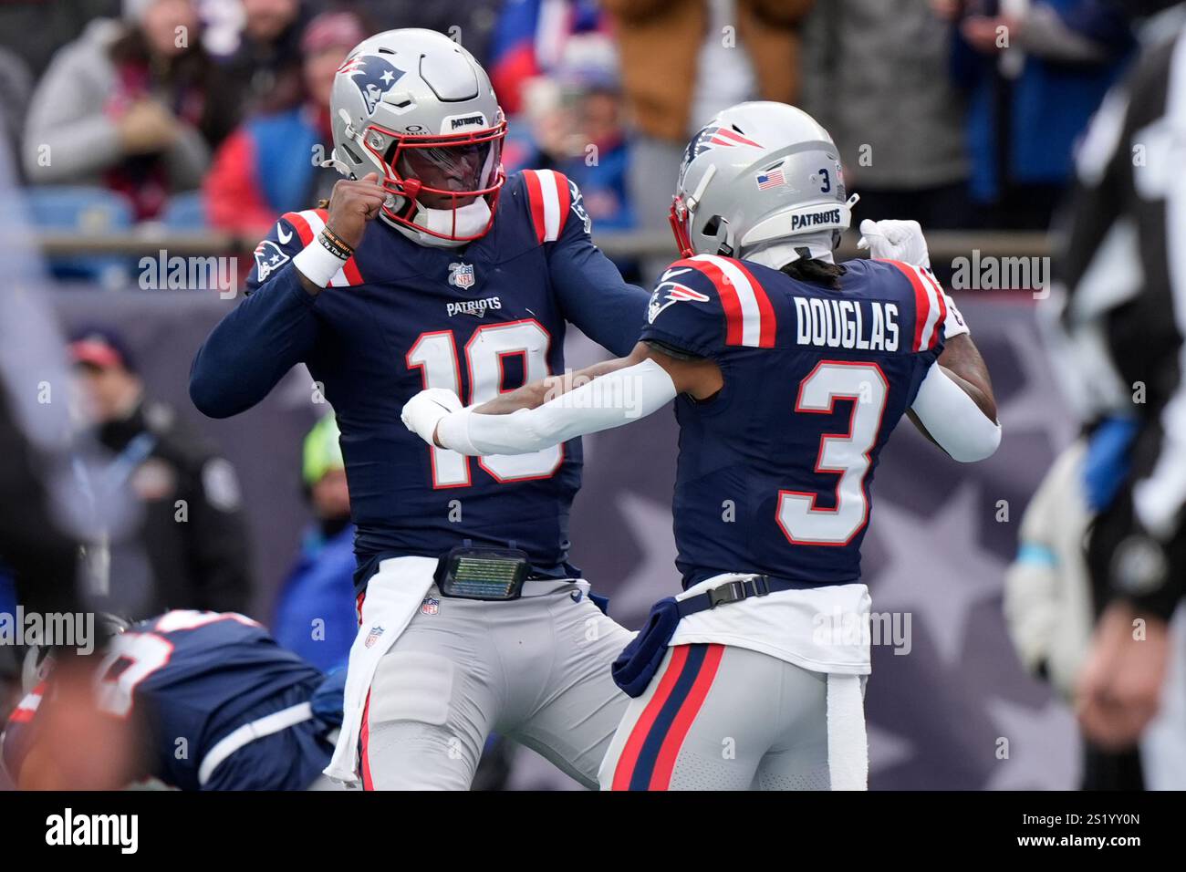 New England Patriots quarterback Joe Milton III (19) celebrates with ...