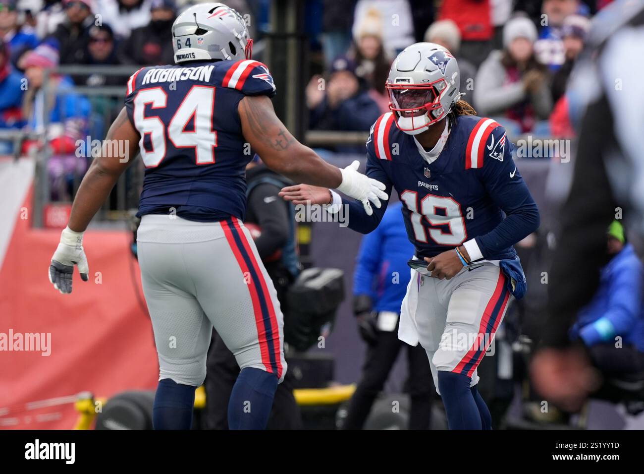 New England Patriots quarterback Joe Milton III (19) celebrates during ...