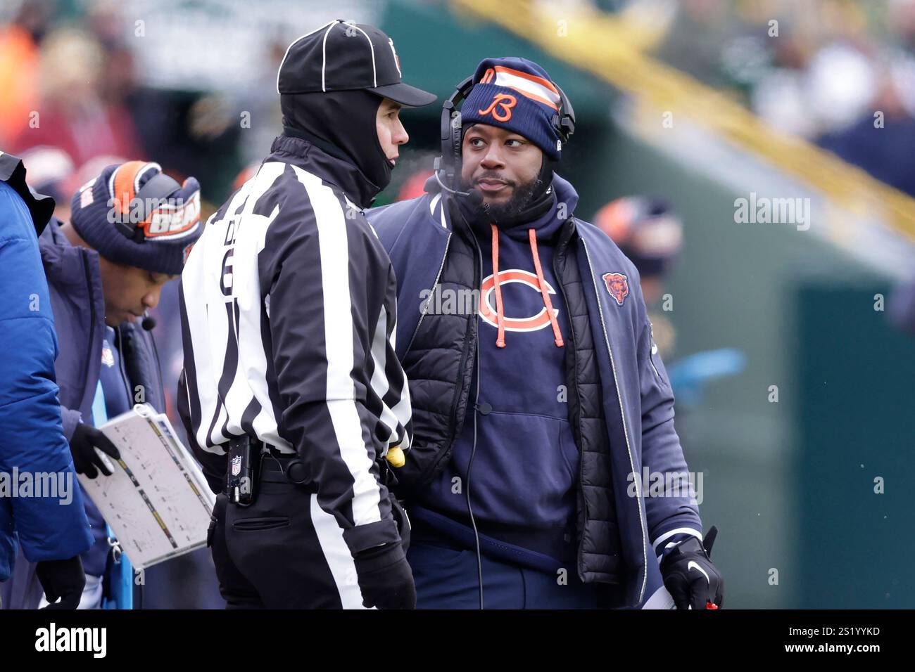 Chicago Bears interim head coach Thomas Brown, right, looks toward down ...