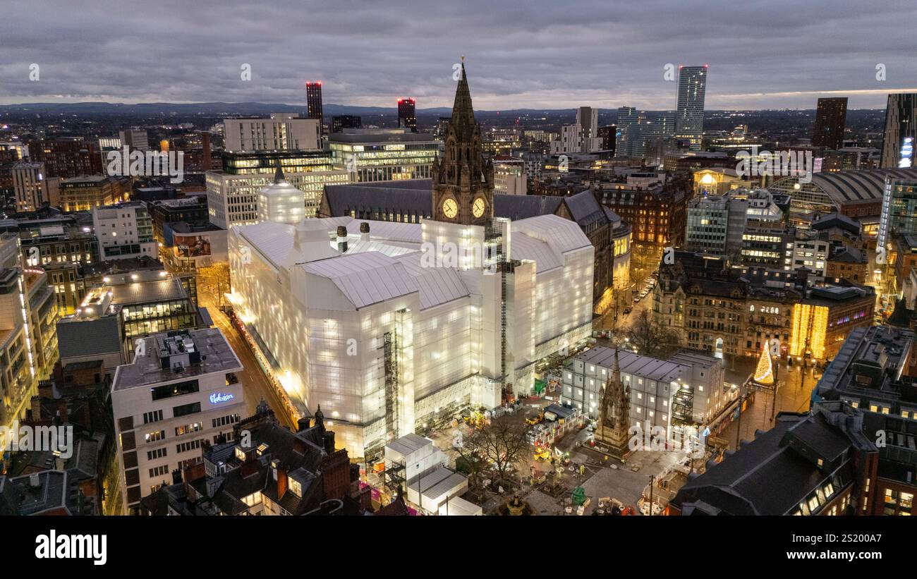Manchester Town hall wrapped in scaffolding during its restoration ...