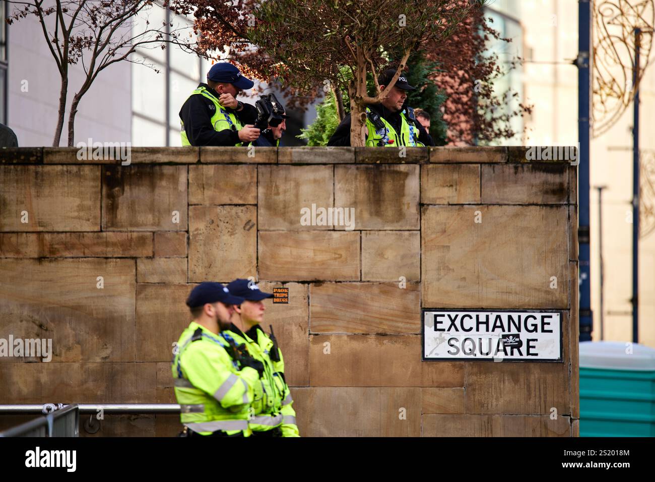 Greater Manchester Police evidence gatherer watching football fans ...