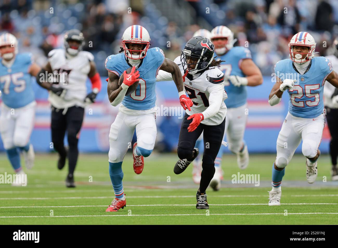 Tennessee Titans wide receiver Calvin Ridley (0) runs with the ball ...