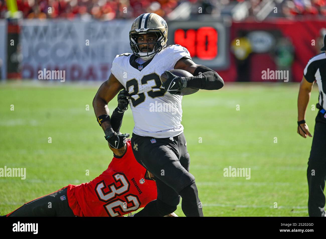New Orleans Saints running back Clyde Edwards-Helaire (23) carries ...