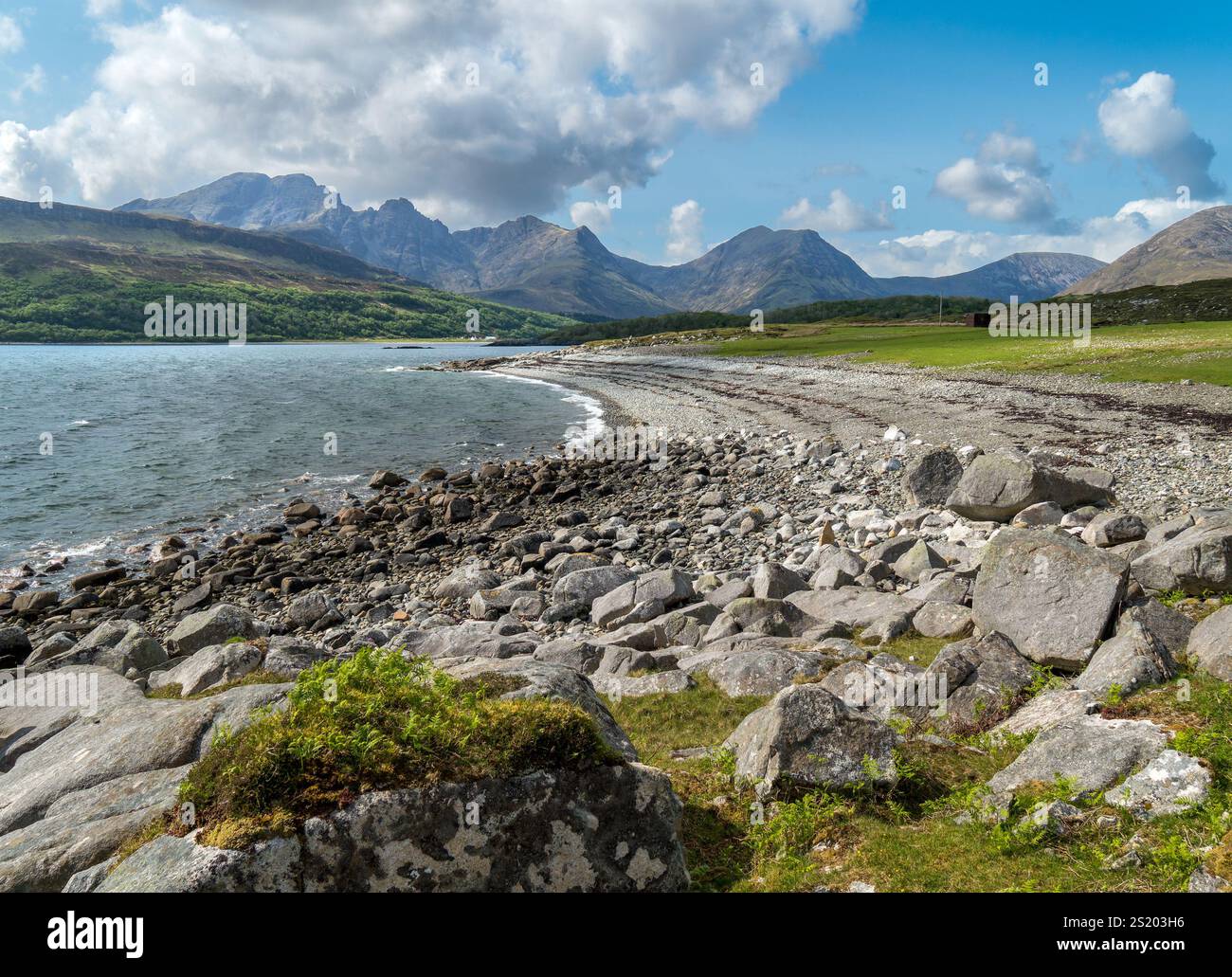 Rocky beach at Camas Malag and Loch Slapin near Torrin with the Cuillin ...