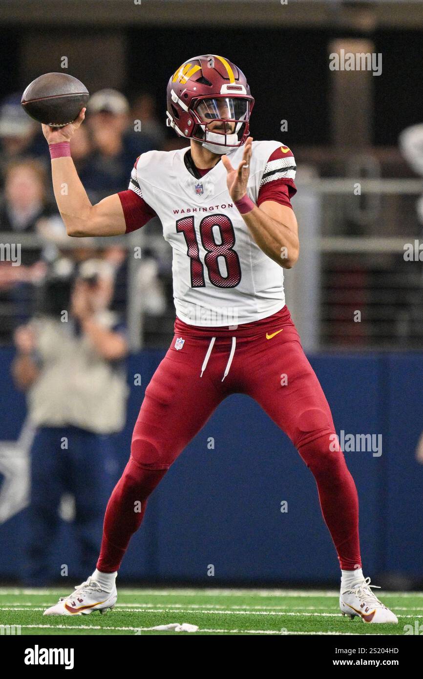 Washington Commanders quarterback Marcus Mariota throws a pass against ...