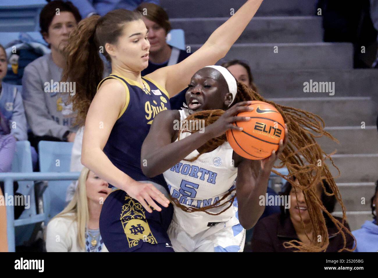 Notre Dame forward Maddy Westbeld, left, defends North Carolina forward ...