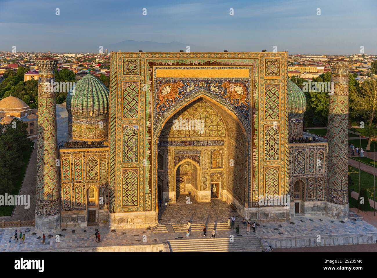 Registan Sher Dor Madrasa in an aerial view at sunset in Samarkand ...
