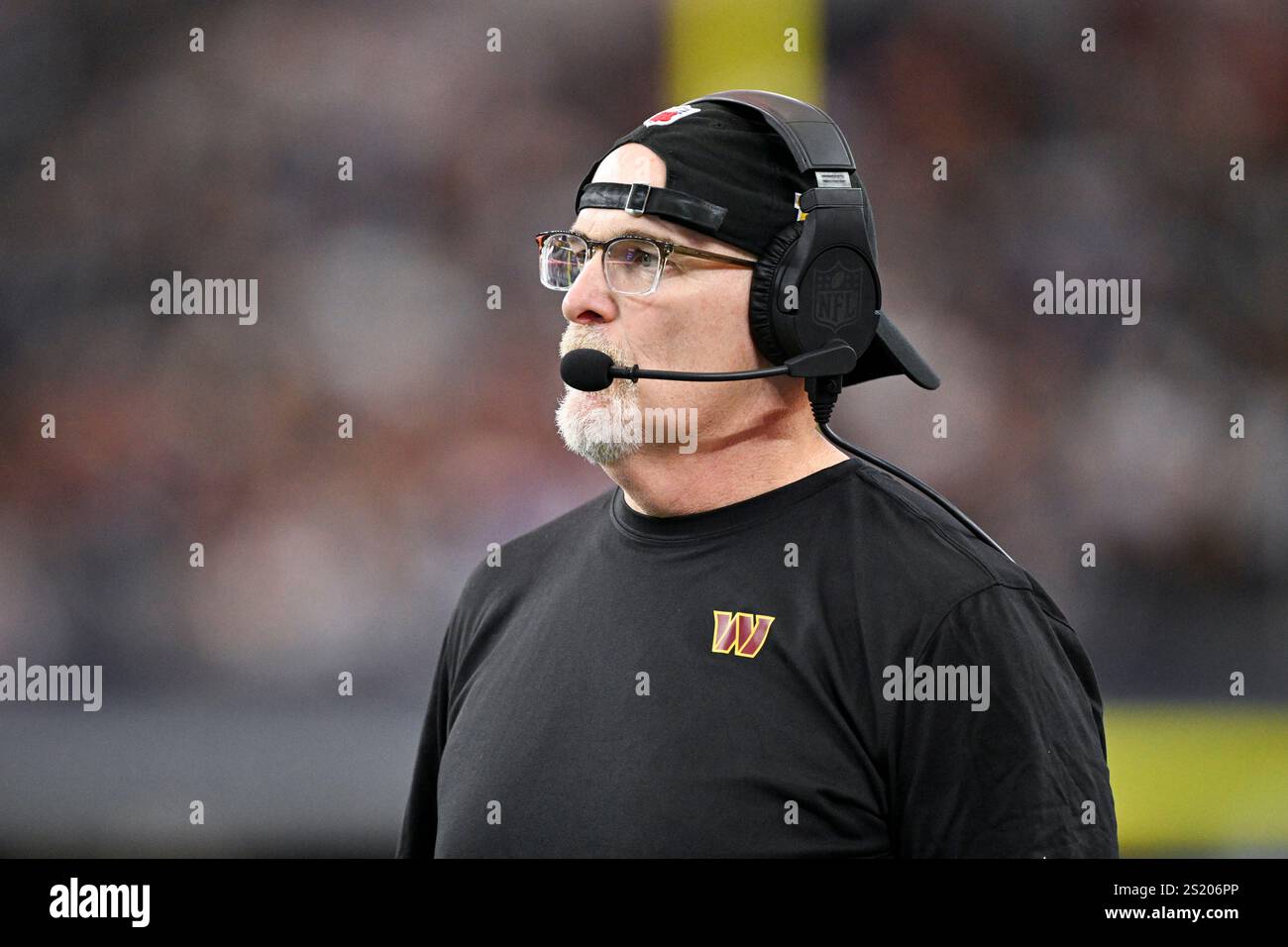 Washington Commanders head coach Dan Quinn looks on during the second half of an NFL football ...
