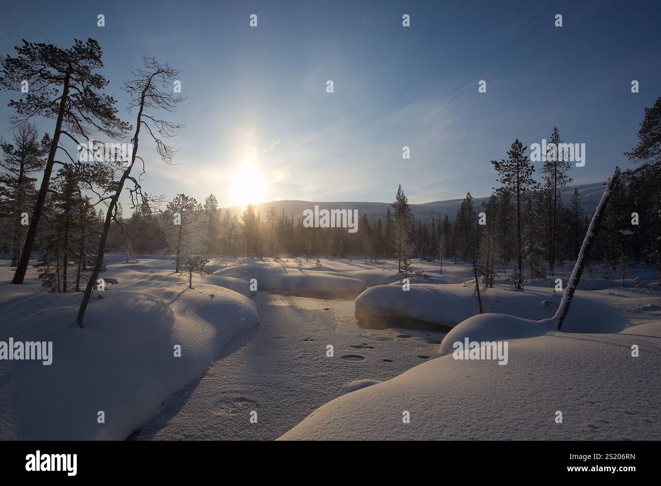 beautiful arctic winter landscape with snowy forest and frozen lake ...