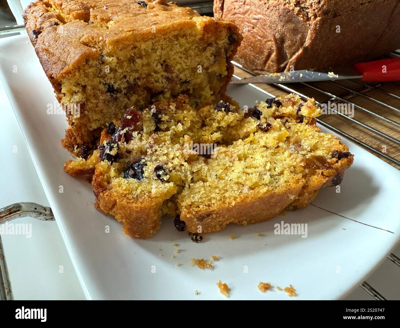 Brazilian corn cake fuba made with corn flour, grapes and walnut at ...