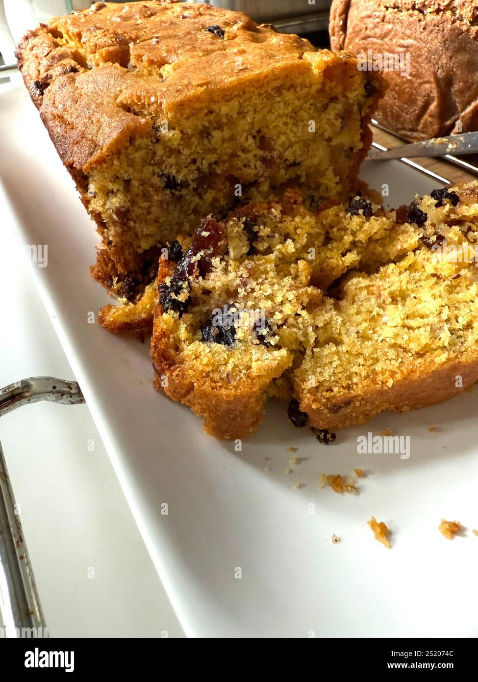 Brazilian corn cake fuba made with corn flour, grapes and walnut at ...