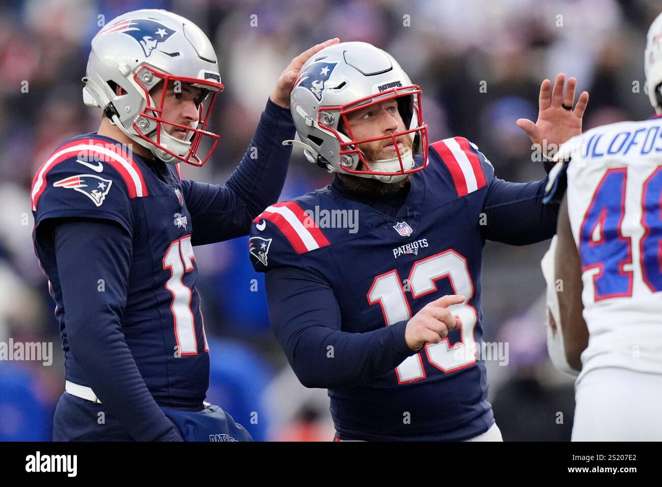 New England Patriots kicker Joey Slye (13) is congratulated after his ...