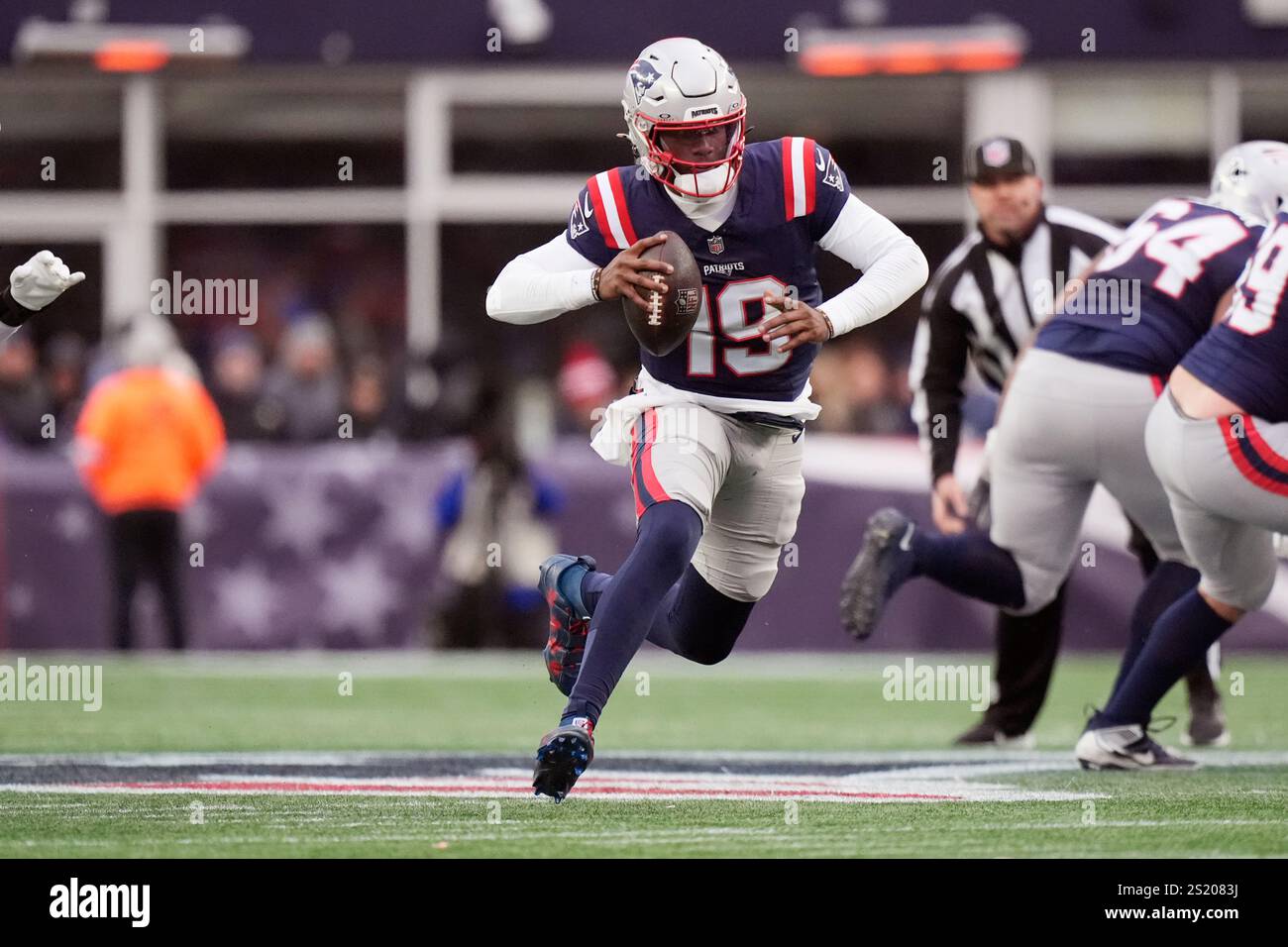 New England Patriots quarterback Joe Milton III rushes during the ...