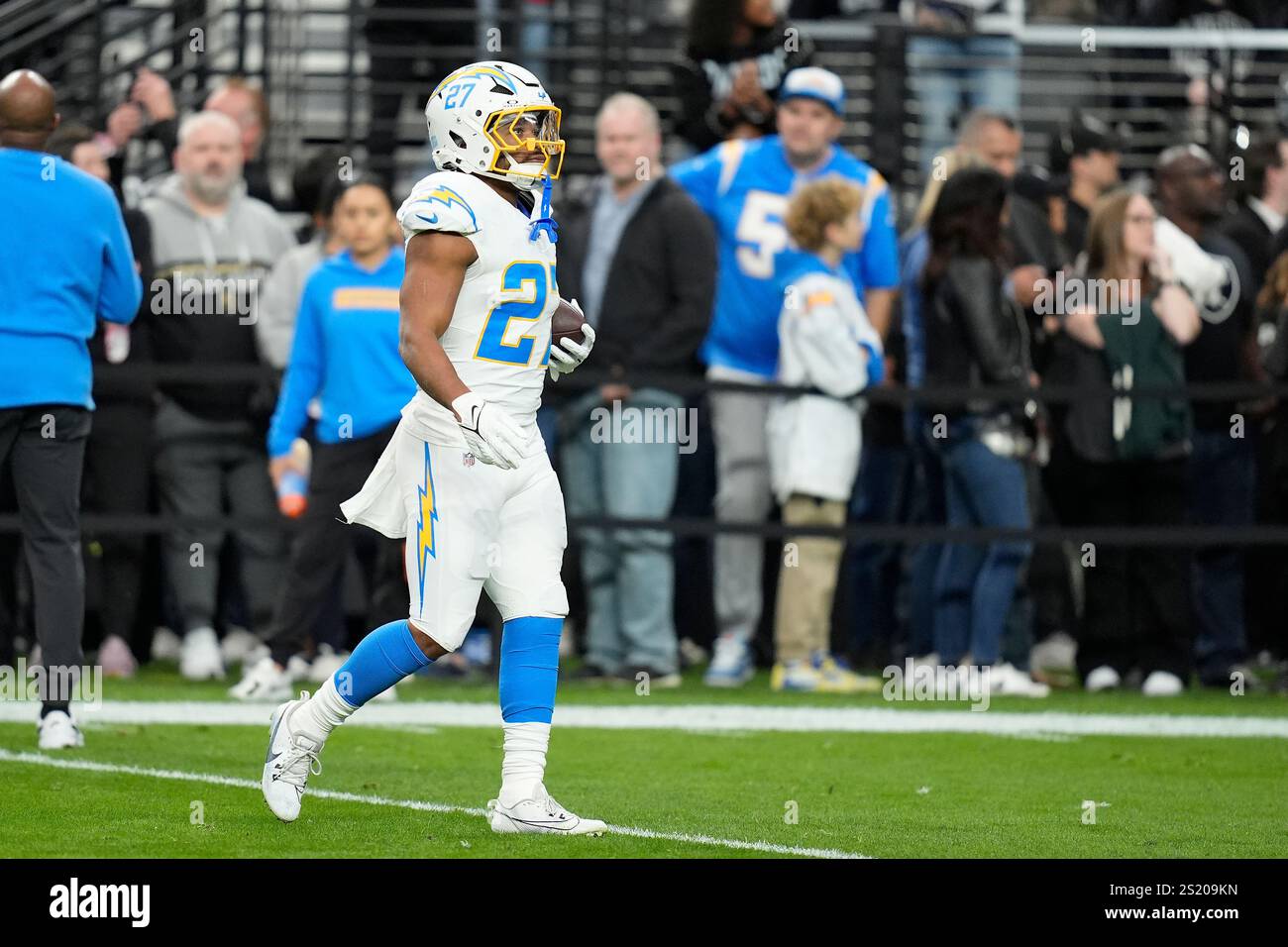 Los Angeles Chargers running back J.K. Dobbins (27) warms up before an ...