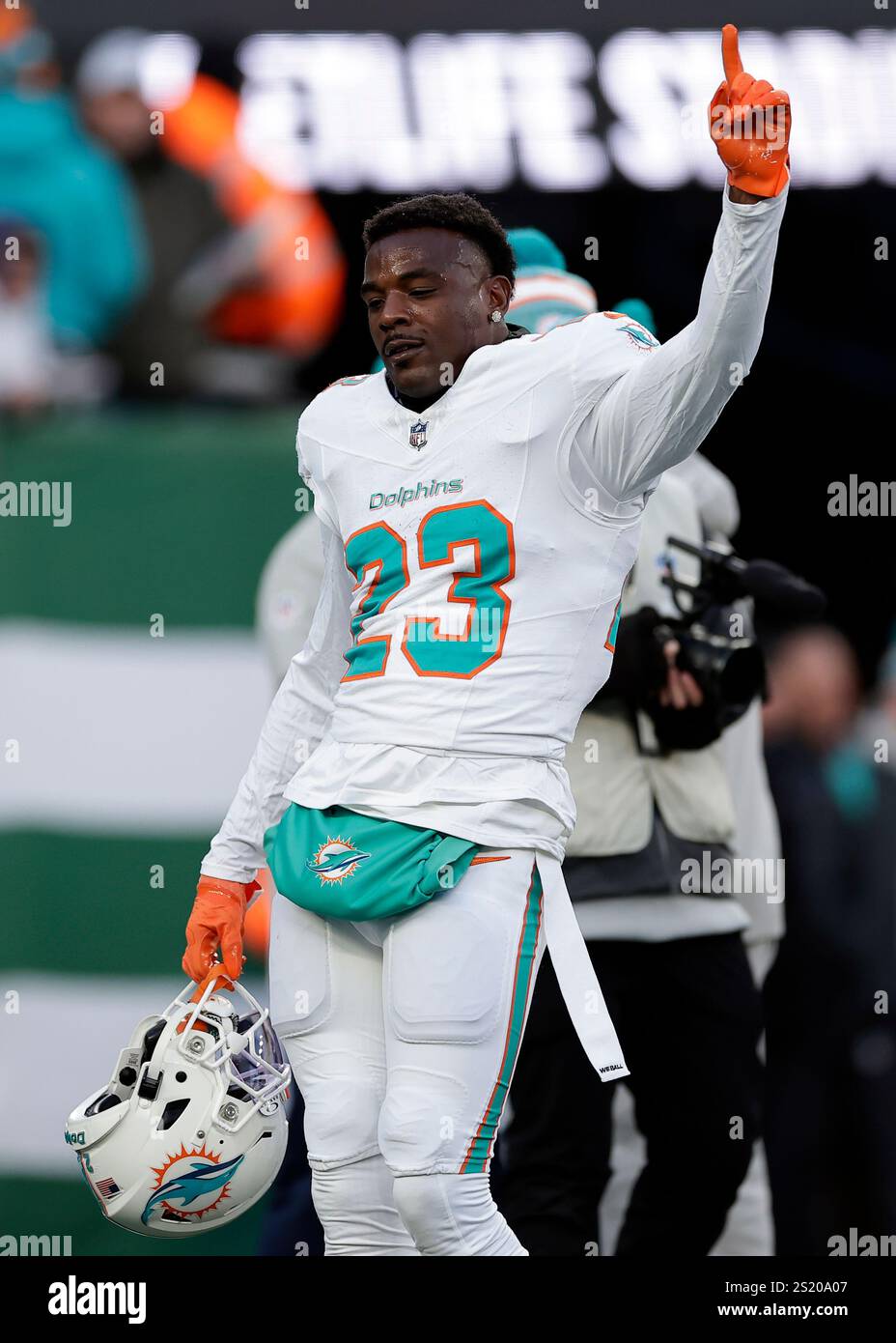 Miami Dolphins running back Jeff Wilson Jr. (23) looks on before an NFL ...