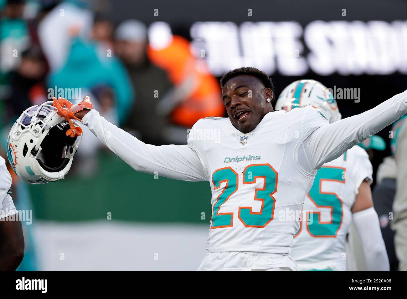 Miami Dolphins running back Jeff Wilson Jr. (23) looks on before an NFL ...