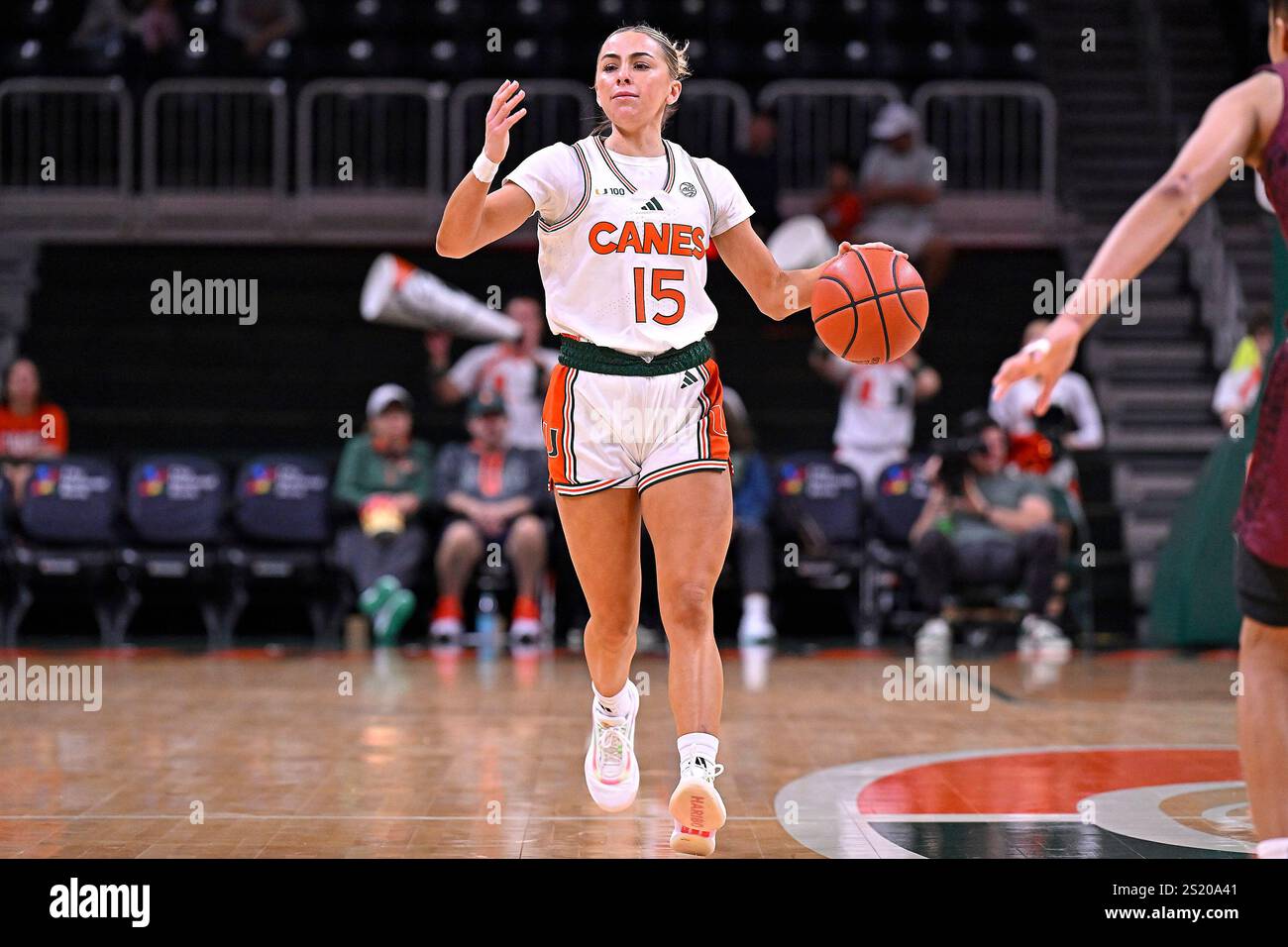 CORAL GABLES, FL - JANUARY 05: Miami guard Hanna Cavinder (15) brings ...