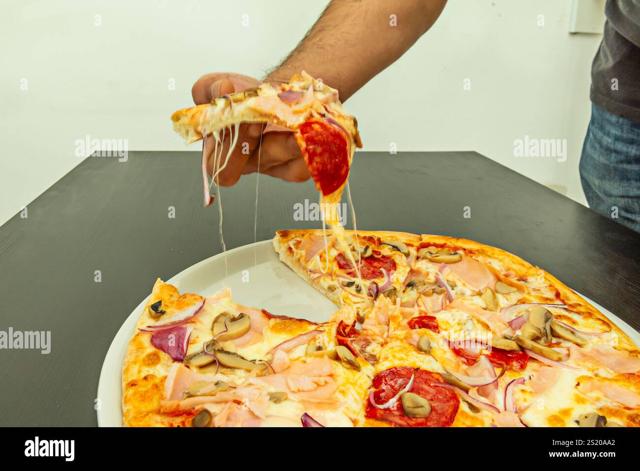 pizza has evolved and adapted to different tastes and cultures Stock ...