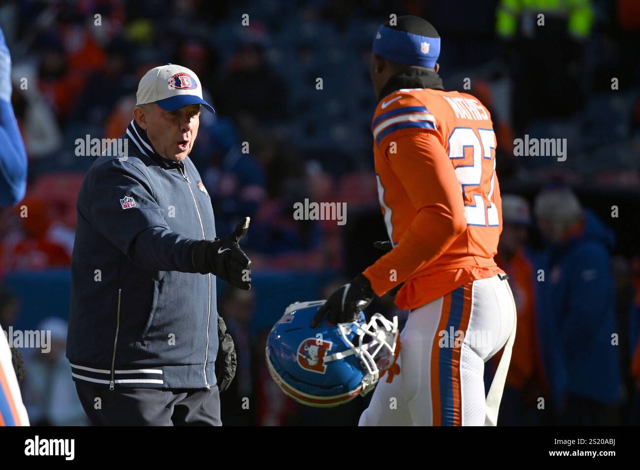 Denver Broncos head coach Sean Payton, left, shakes hands with ...