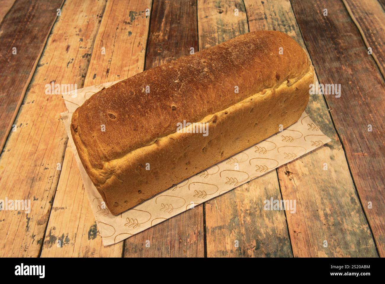 The loaf is a type of large, traditional pan made with wheat flour and ...
