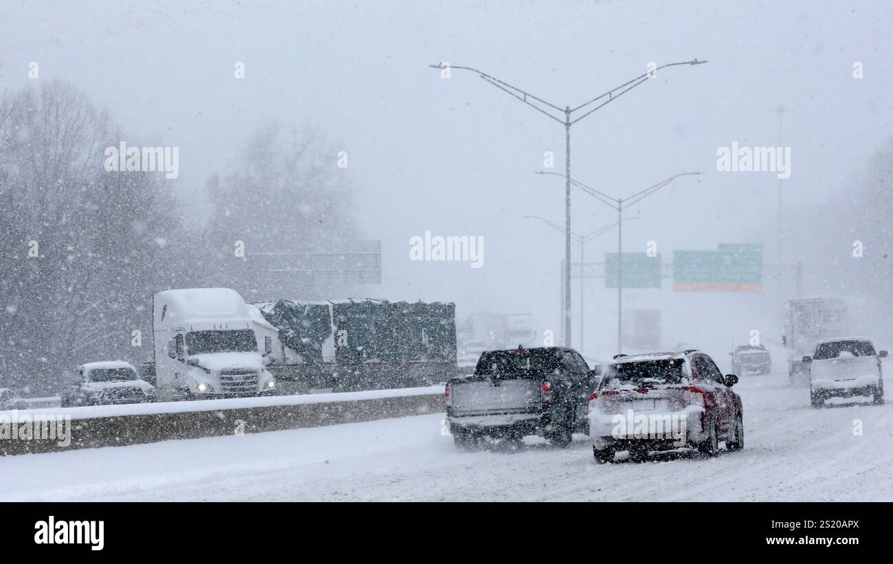 Louisville, United States. 05th Jan, 2025. Trucks and cars are stuck in ...