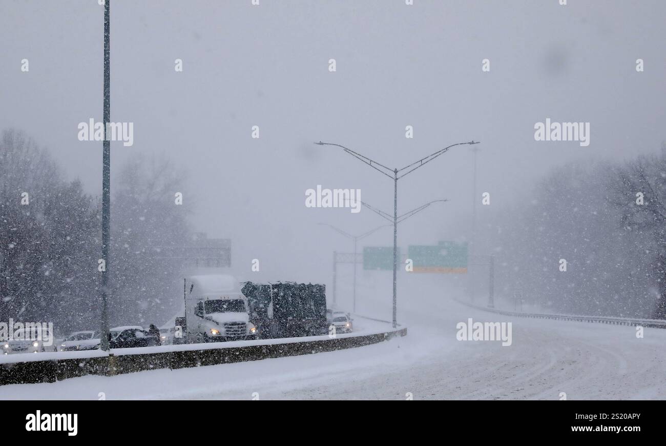 Louisville, United States. 05th Jan, 2025. Trucks and cars are stuck in ...