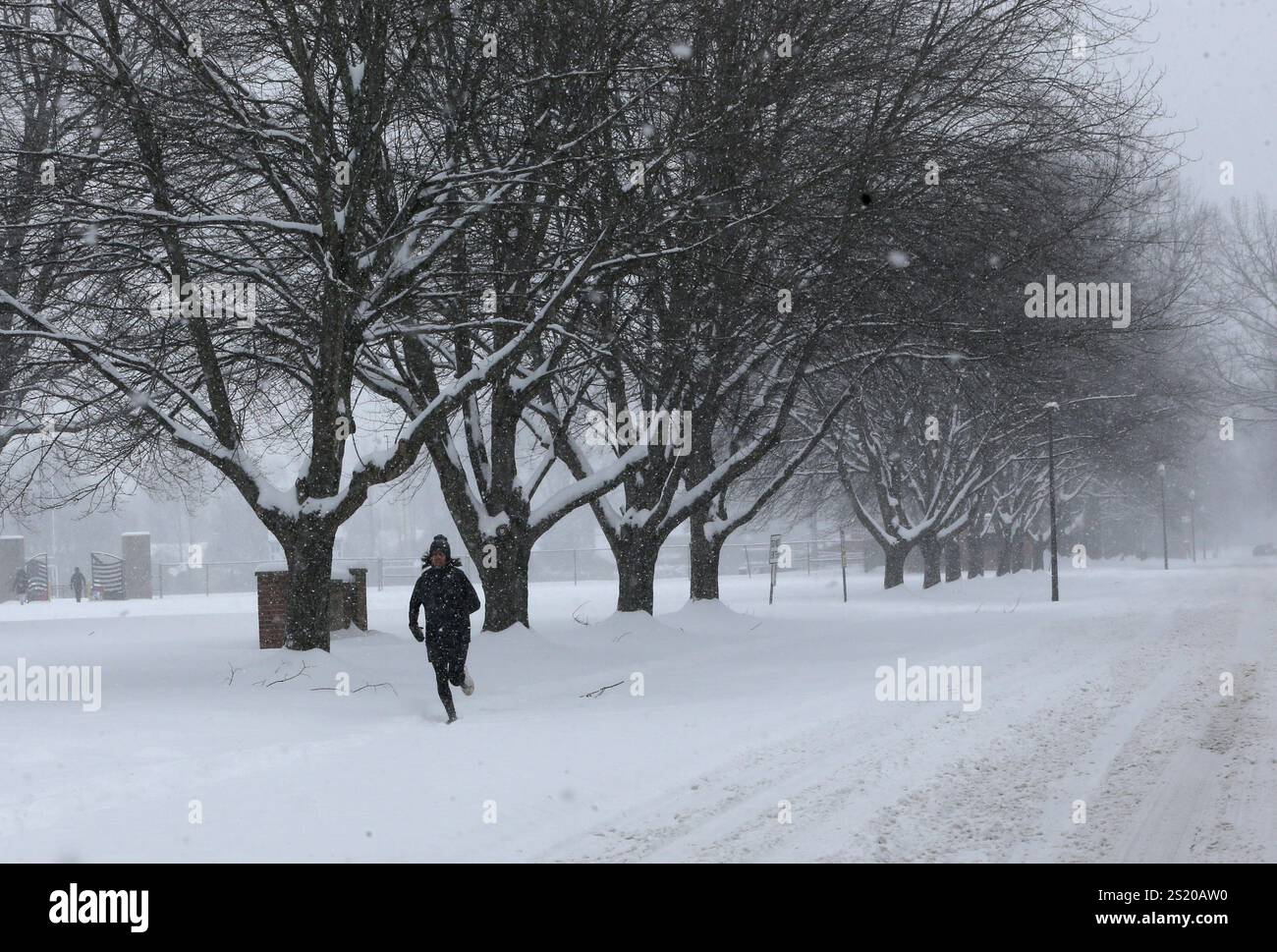 Louisville, United States. 05th Jan, 2025. A jogger runs in the deep ...