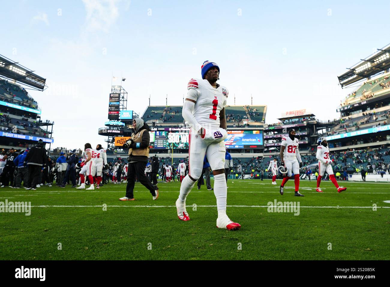 New York Giants wide receiver Malik Nabers (1) walks off the field ...