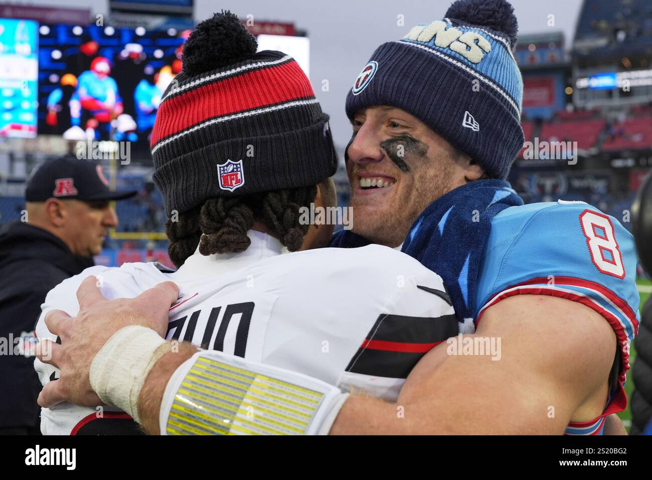 Tennessee Titans quarterback Will Levis (8) hugs Houston Texans ...