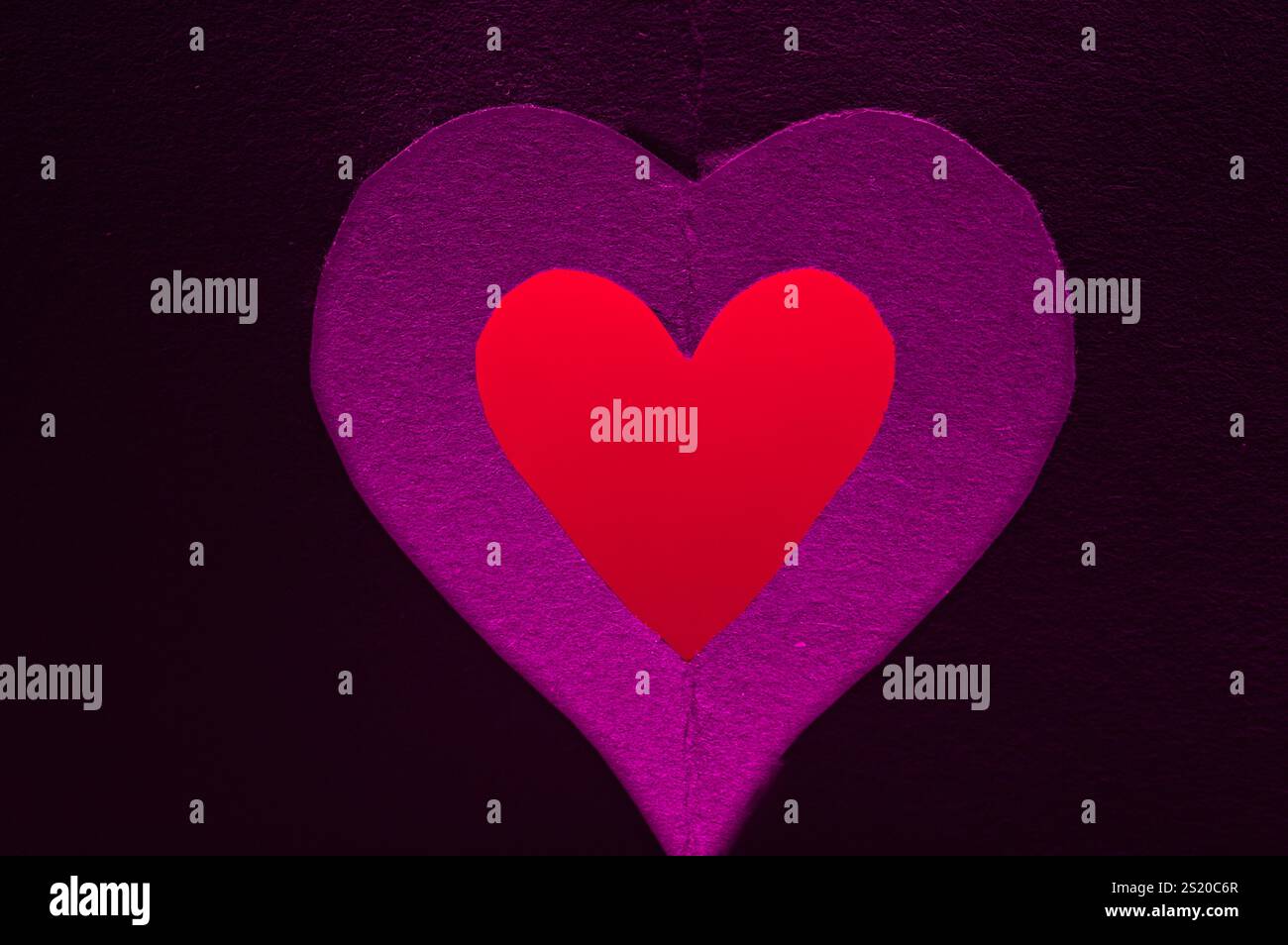 Cardboard Heart Cutout in a heart cutout with red and pink colors Stock ...