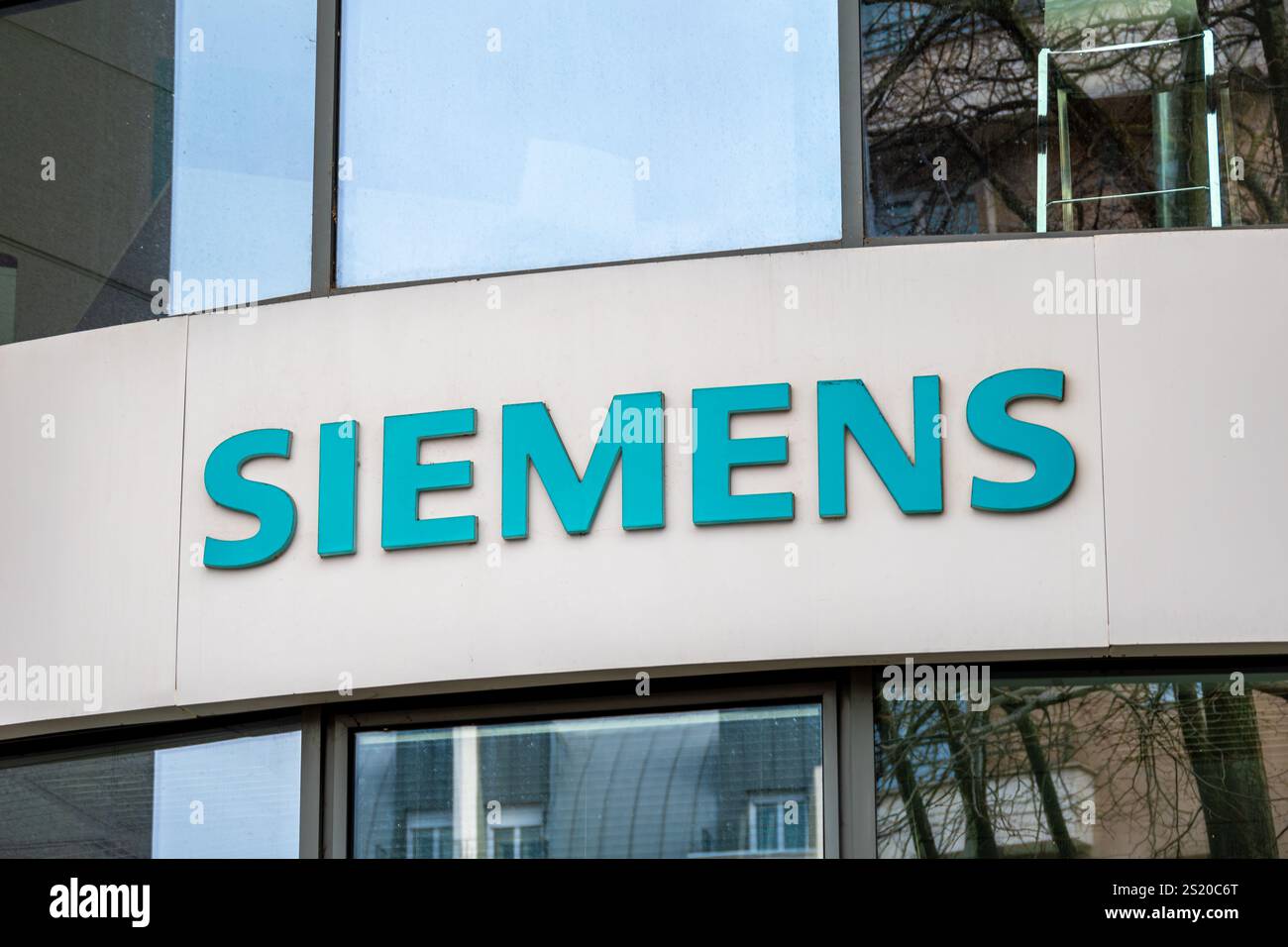 Sign at the entrance of a Siemens Mobility building. Siemens is a German engineering ...