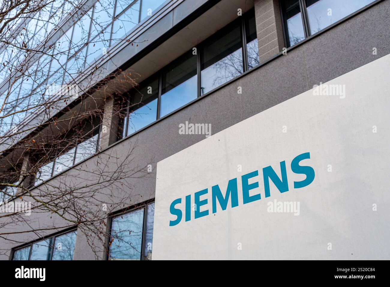 Sign at the entrance of a Siemens Mobility building. Siemens is a ...