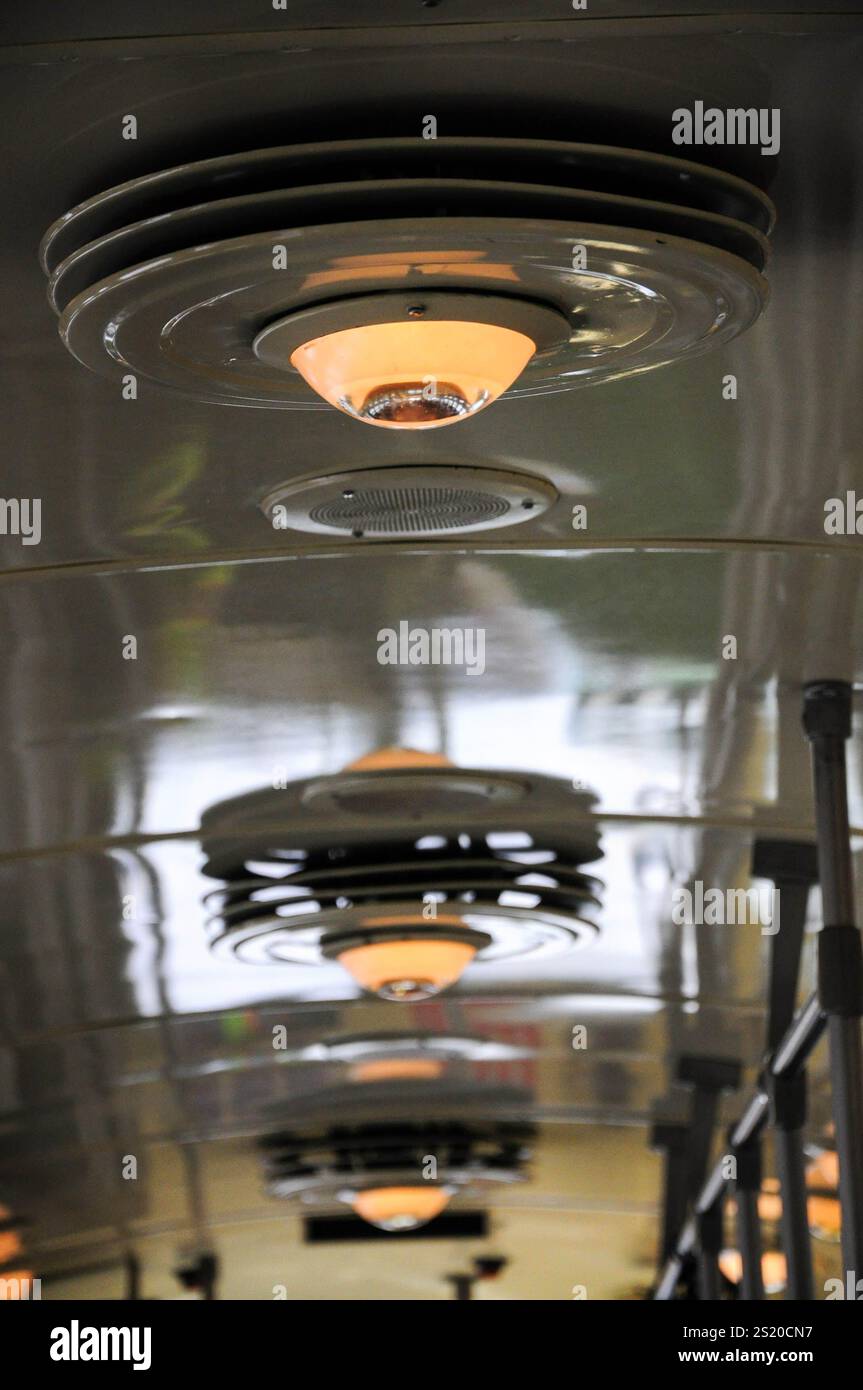 Vintage lighting inside retro San Francisco streetcar reflecting on ...