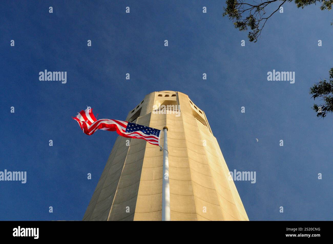 Coit Tower and American Flag under Clear Blue Sky Stock Photo - Alamy