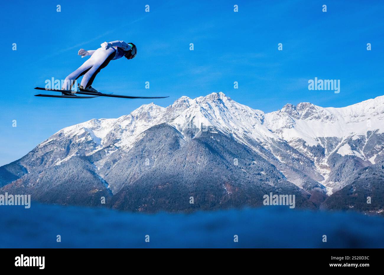 Panoramic view with skijumper Lovro Kos, SLO at the 73. Four Hills ...