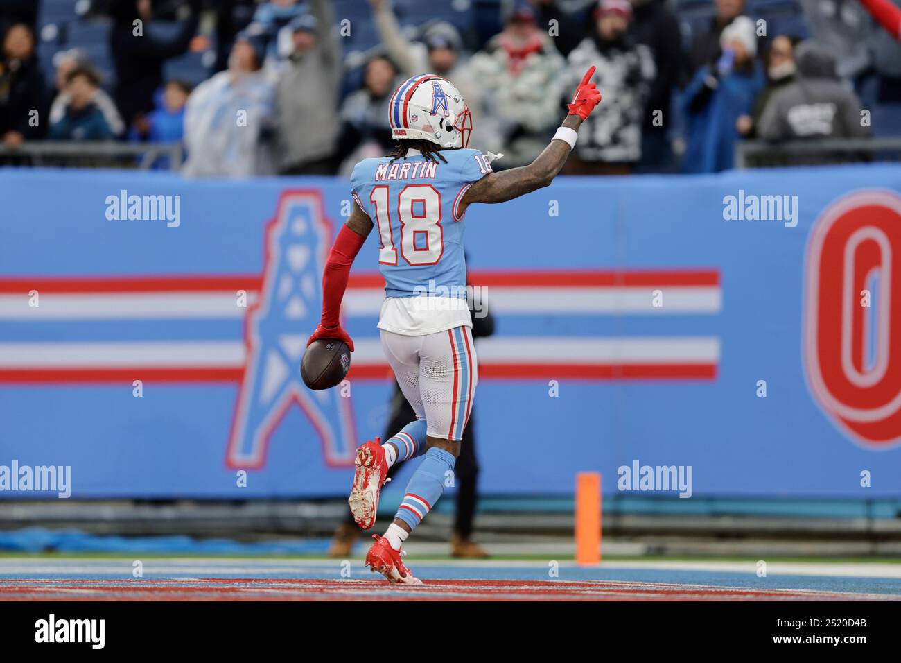 Tennessee Titans wide receiver Tay Martin (18) catches a pass for a ...