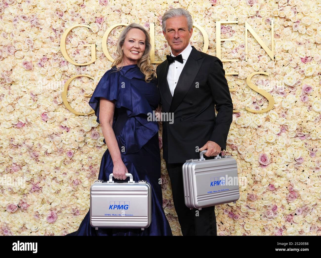 KPMG representatives arrive at the 82nd Golden Globes on Sunday, Jan. 5 ...