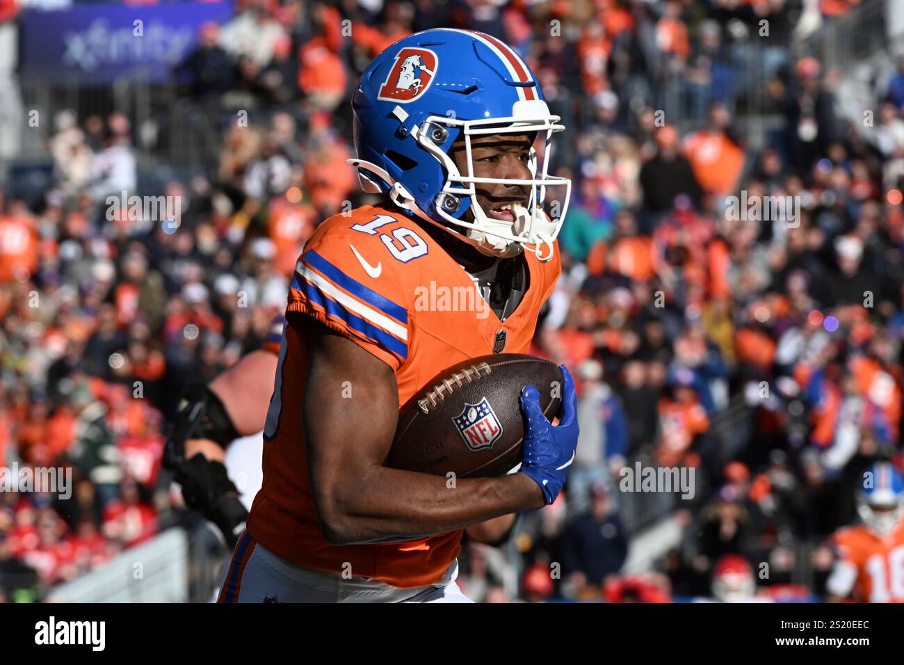 Denver Broncos wide receiver Marvin Mims Jr. scores on a 32-yard catch ...