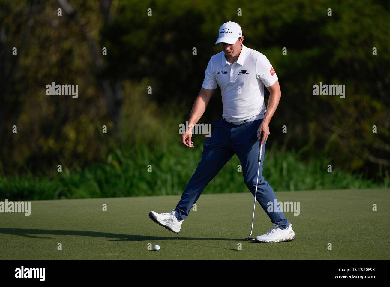 Matt Fitzpatrick reacts as his ball rolls away from the hole on the ...
