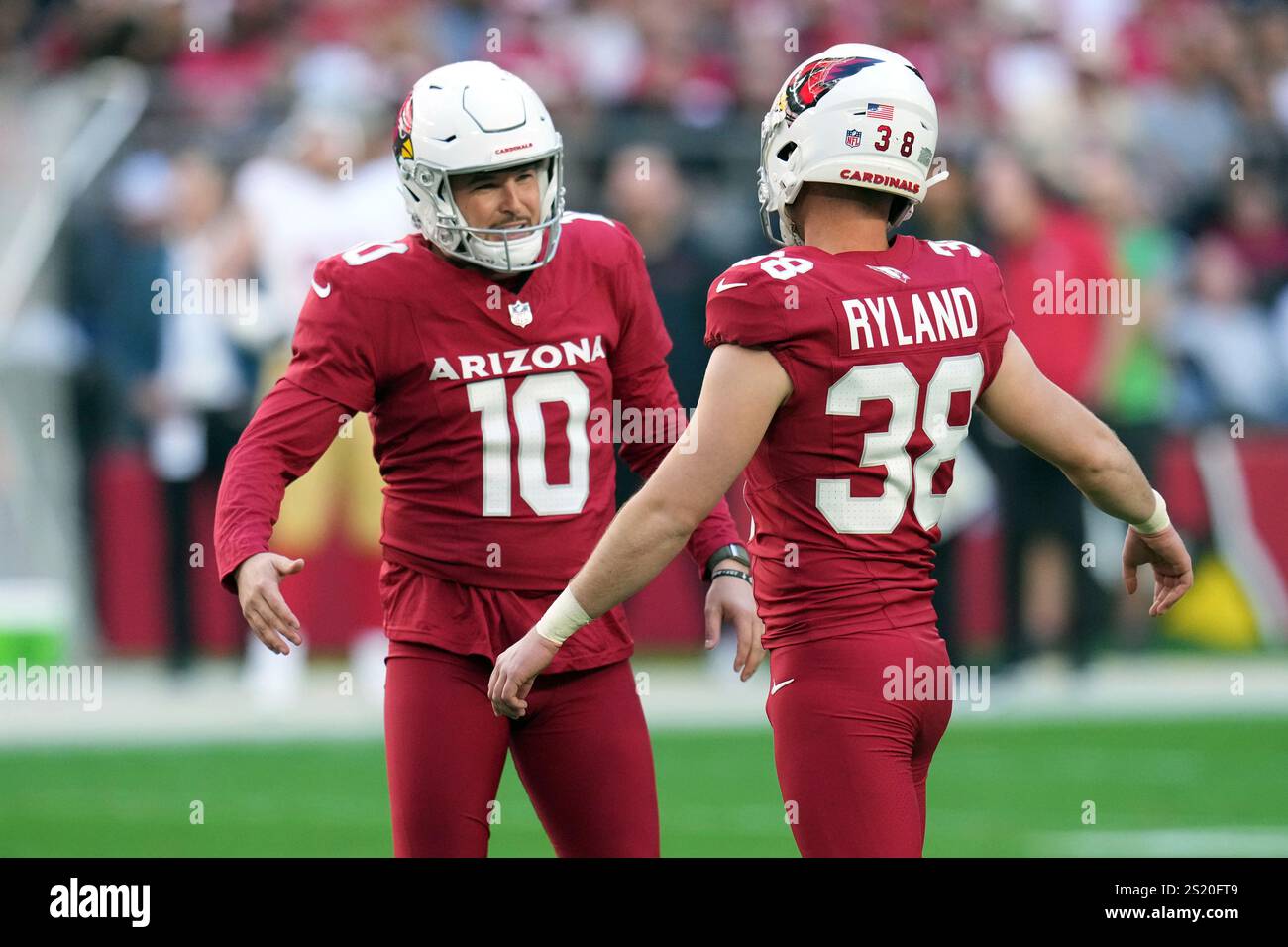 Arizona Cardinals punter Michael Palardy (10) congratulates place ...
