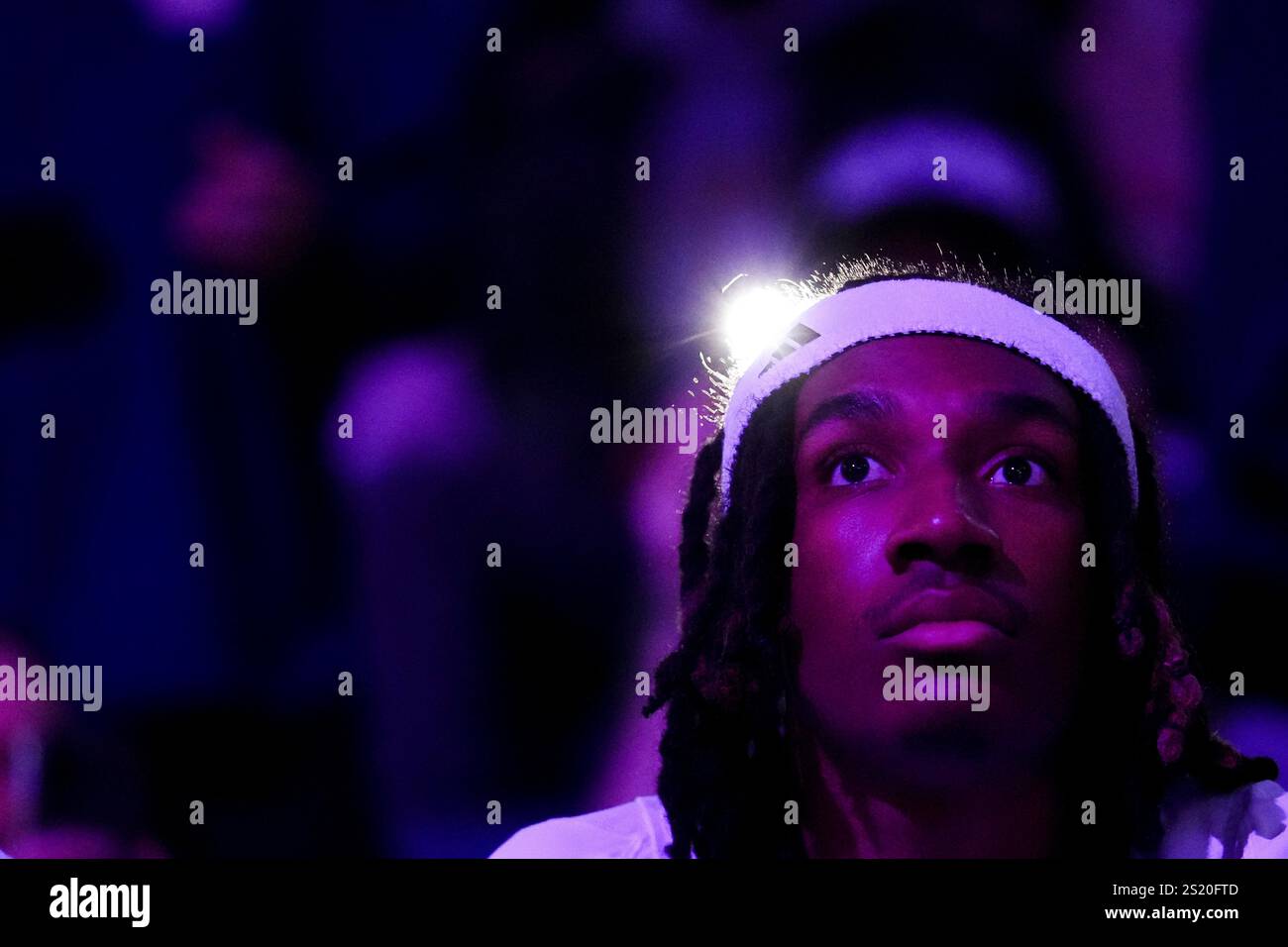 Washington guard Tyler Harris looks on during pregame introductions ...