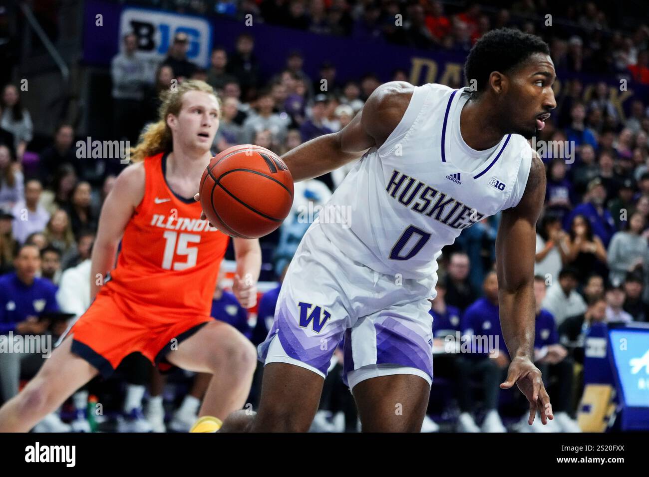 Washington guard Mekhi Mason looks on after grabbing the rebound ...