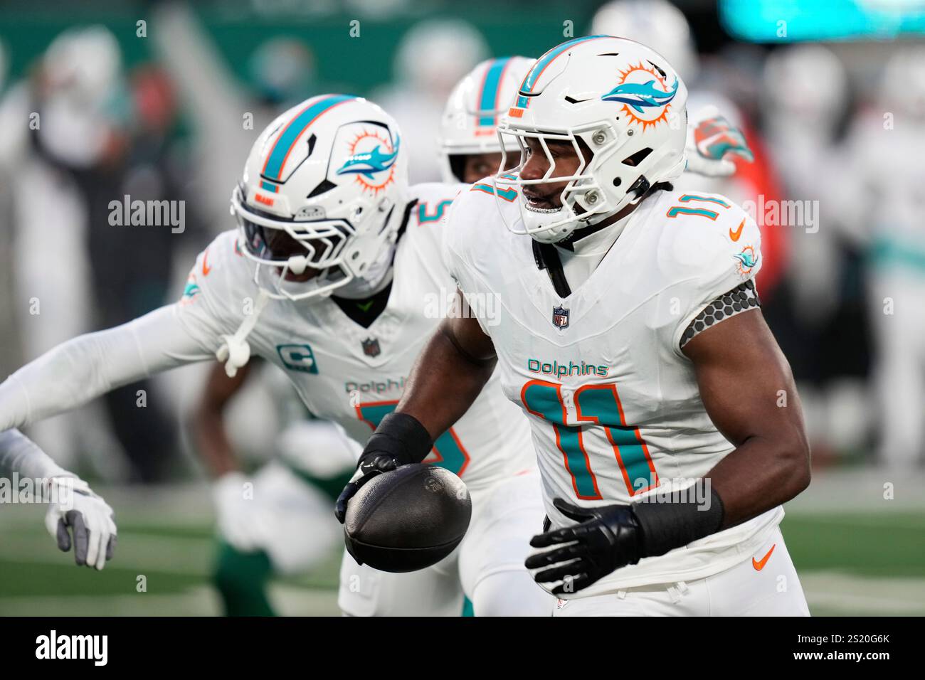 Miami Dolphins linebacker Tyrel Dodson (11) runs the ball after ...