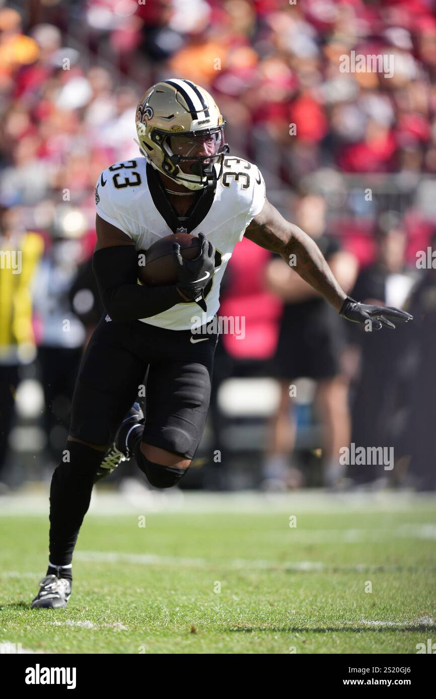 New Orleans Saints running back Jordan Mims (33) rushes with the ball ...