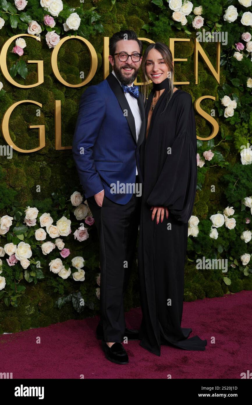 Adam Rose, left, and Joanna Kabbara arrive at the 82nd Golden Globes on ...