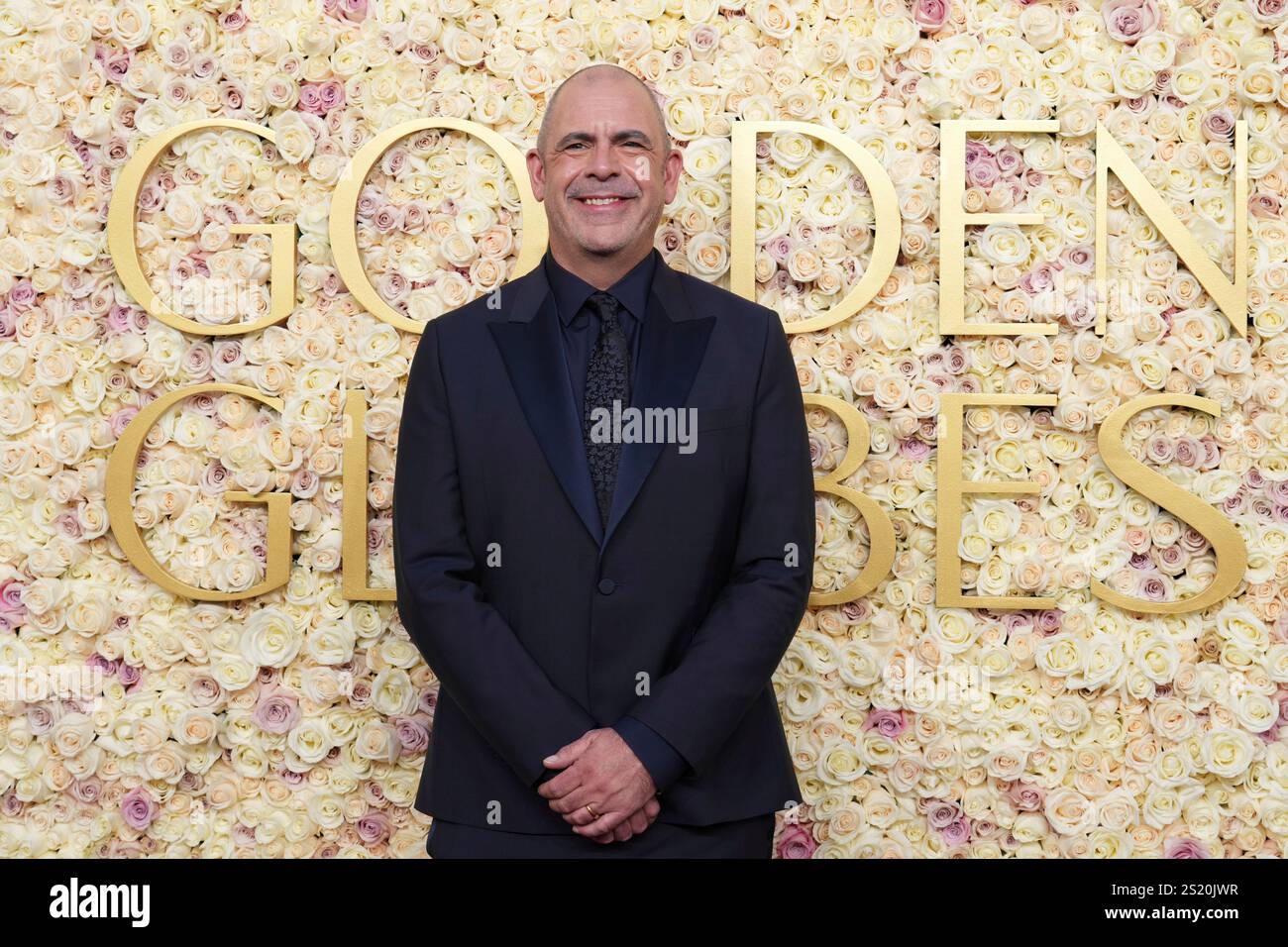 Nigel Marchant arrives at the 82nd Golden Globes on Sunday, Jan. 5 ...