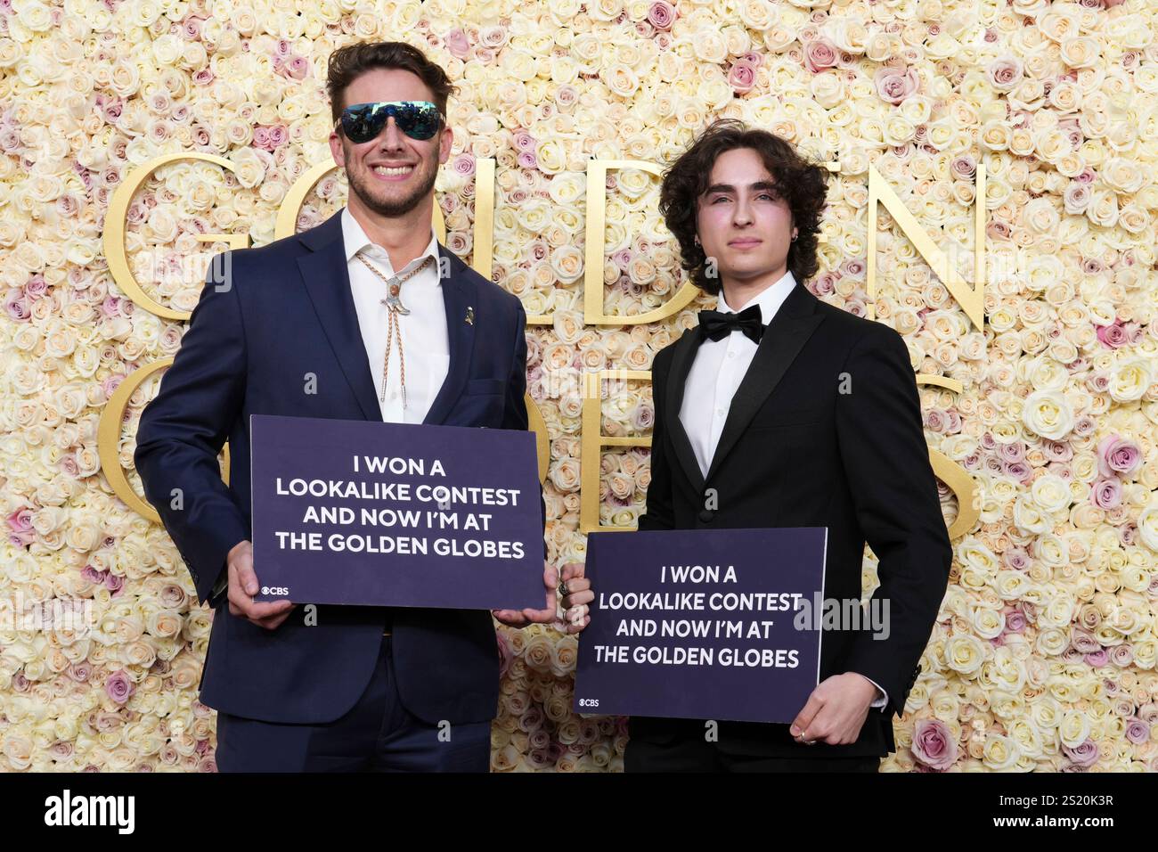 Max Braunstein, left, and Miles Mitchell arrive at the 82nd Golden ...
