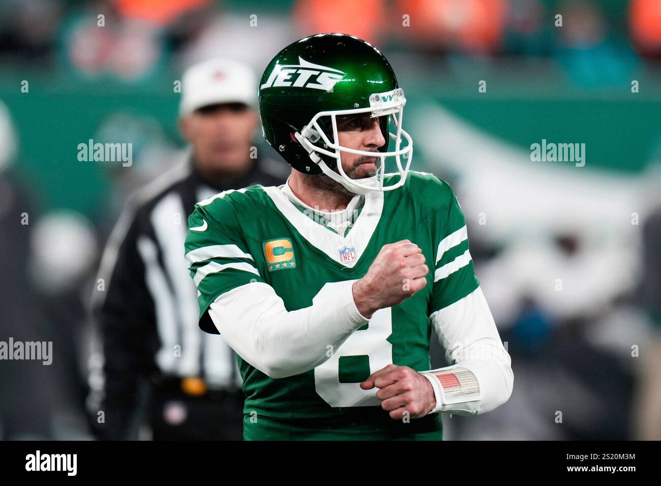 New York Jets quarterback Aaron Rodgers (8) reacts after his second ...