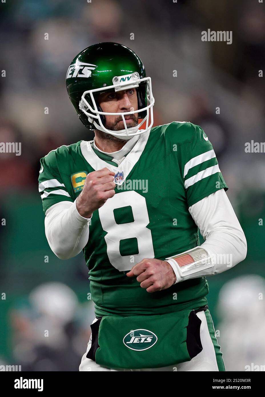 New York Jets quarterback Aaron Rodgers (8) reacts after throwing a ...